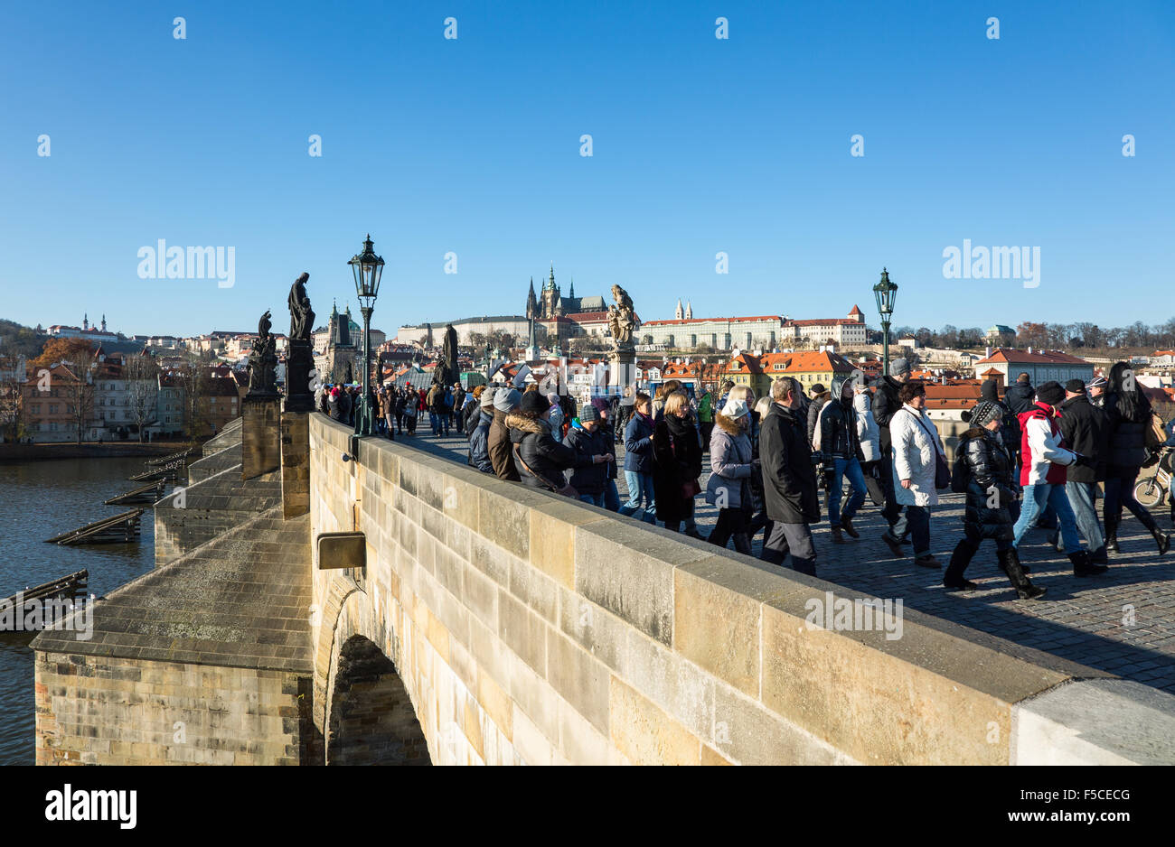 Prague, people on the Charles bridge on the Moldava river Stock Photo ...