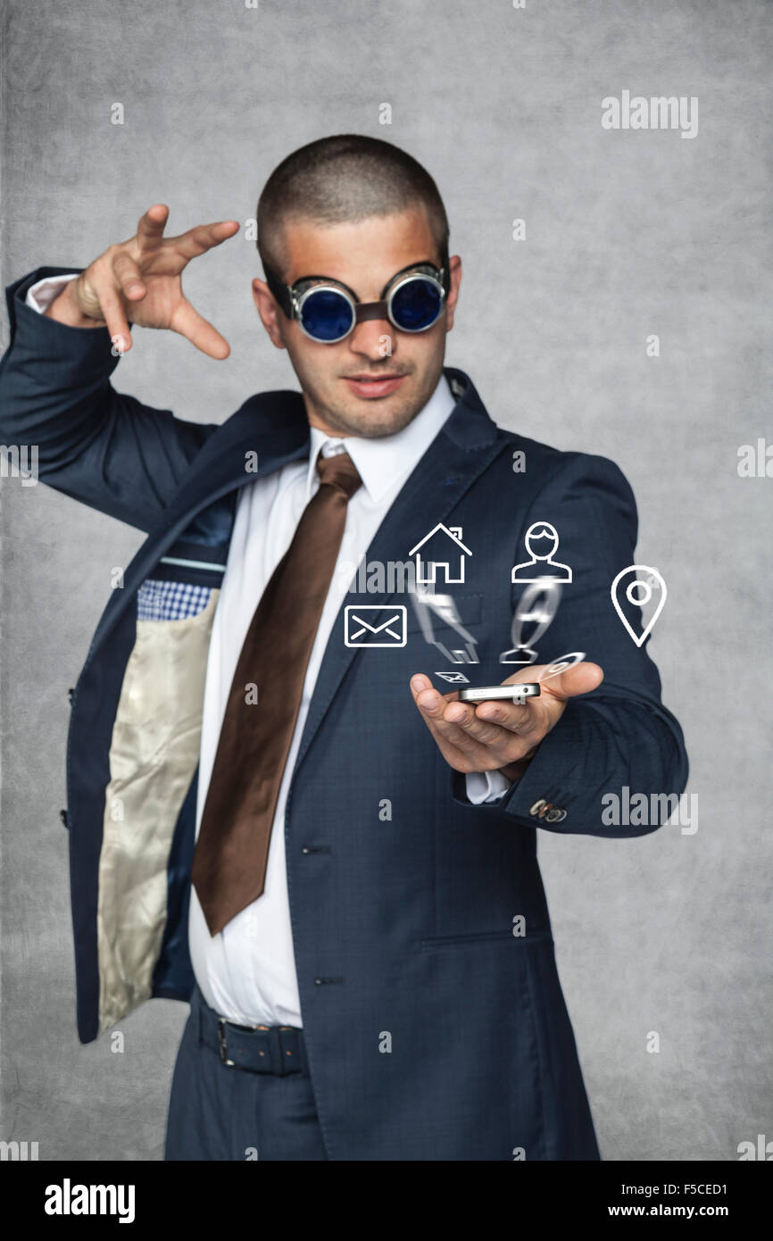 businessman holds a future mobile phone with hologram function Stock ...