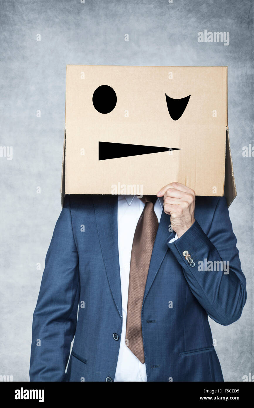 moment for reflection, businessman hiding inside the box Stock Photo ...