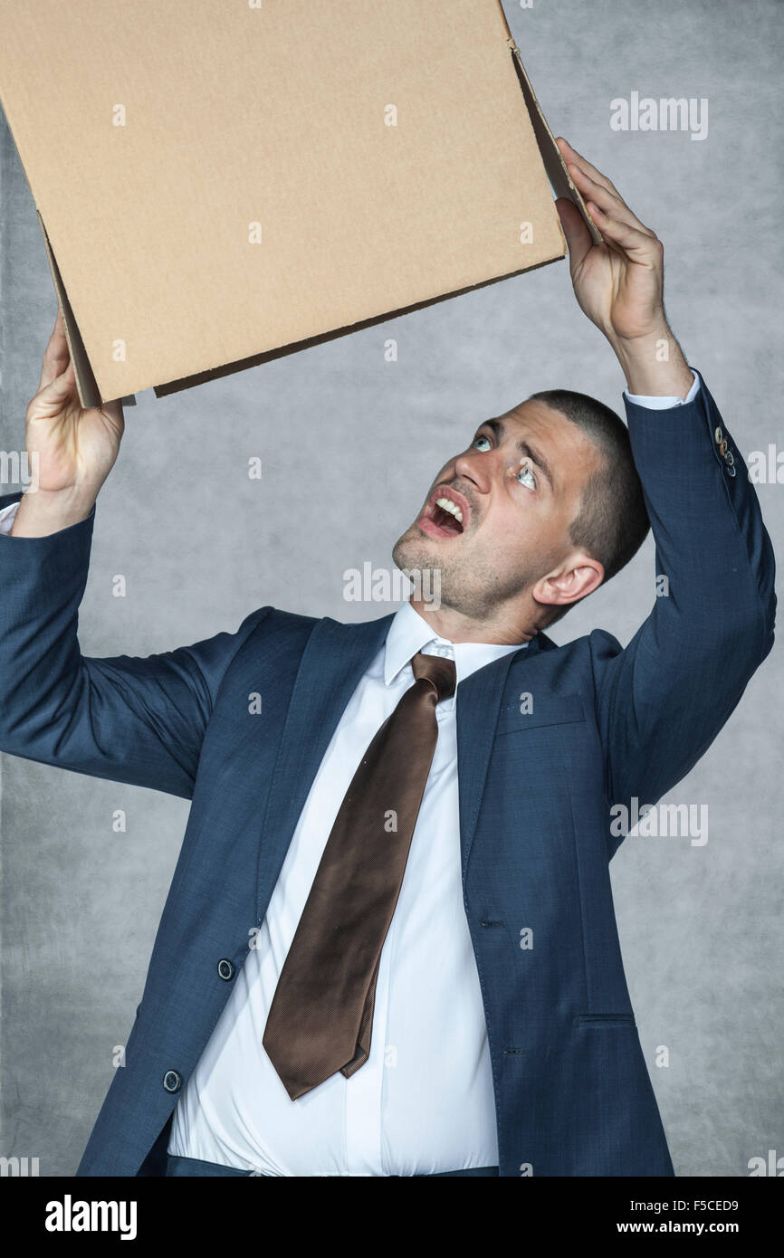 businessman looking inside empty box, searching inspiration Stock Photo ...