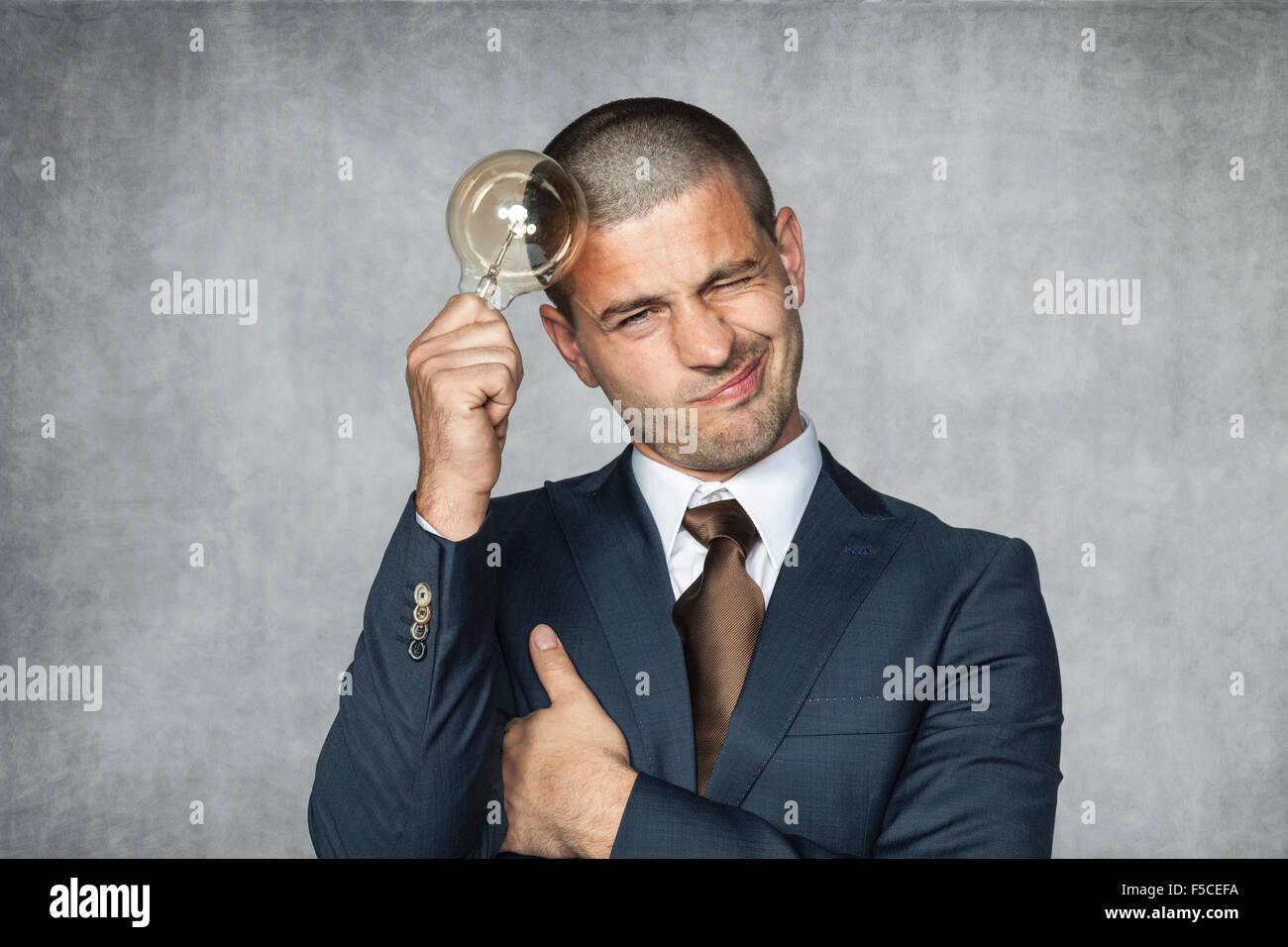 businessman with an idea for saving Stock Photo - Alamy