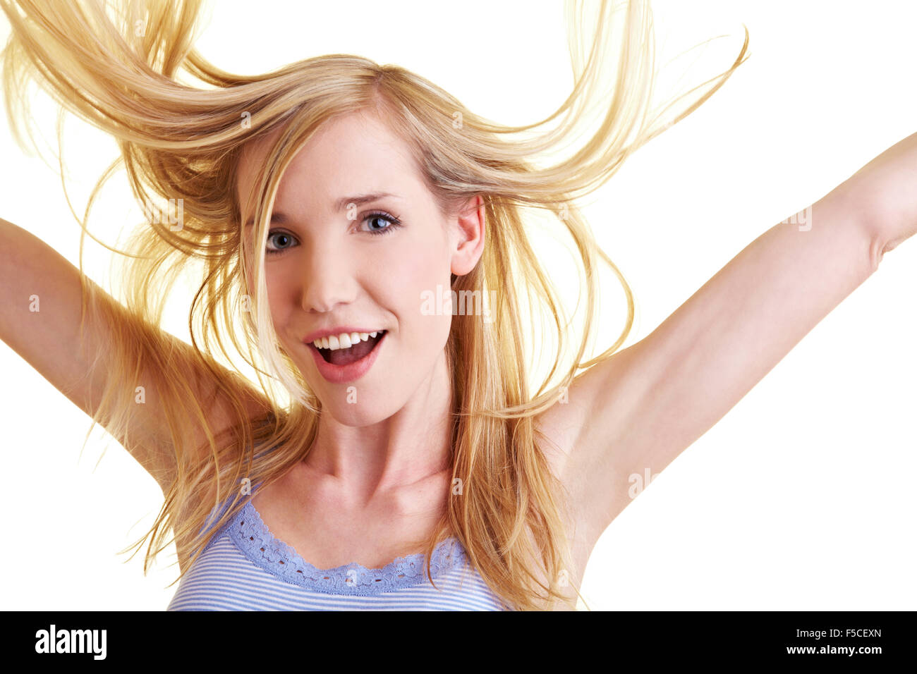 Happy blonde woman lets her hair fly Stock Photo - Alamy
