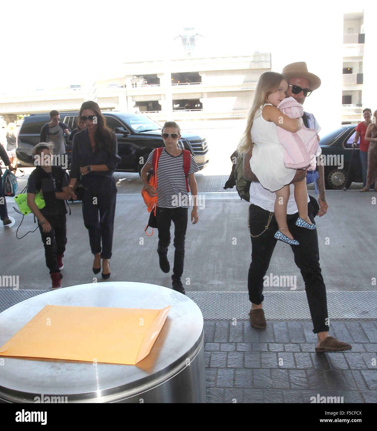David Beckham, wife Victoria and their four children arrive at Los ...