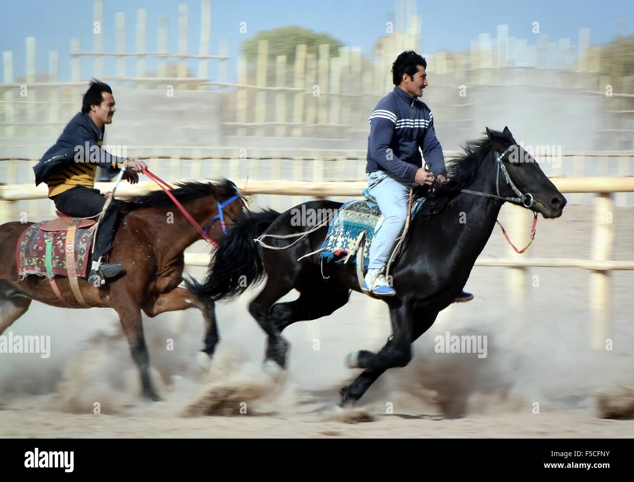 Bachu, China's Xinjiang Uygur Autonomous Region. 1st Nov, 2015. Locals ...