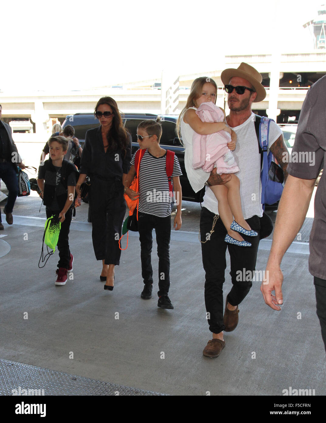 David Beckham, wife Victoria and their four children arrive at Los ...