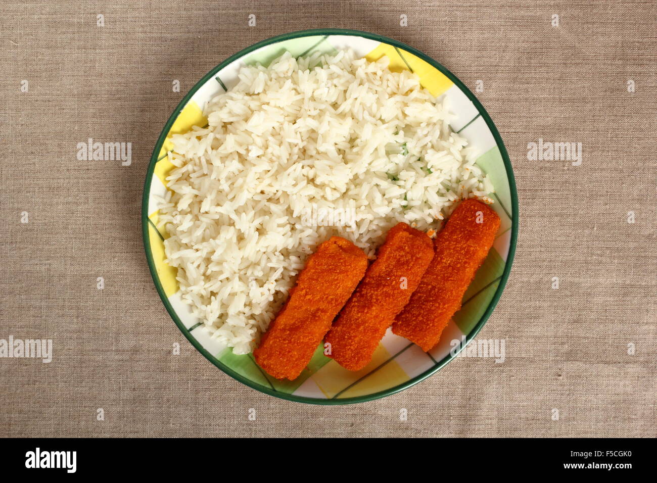 Rice and Fish Fingers Stock Photo - Alamy