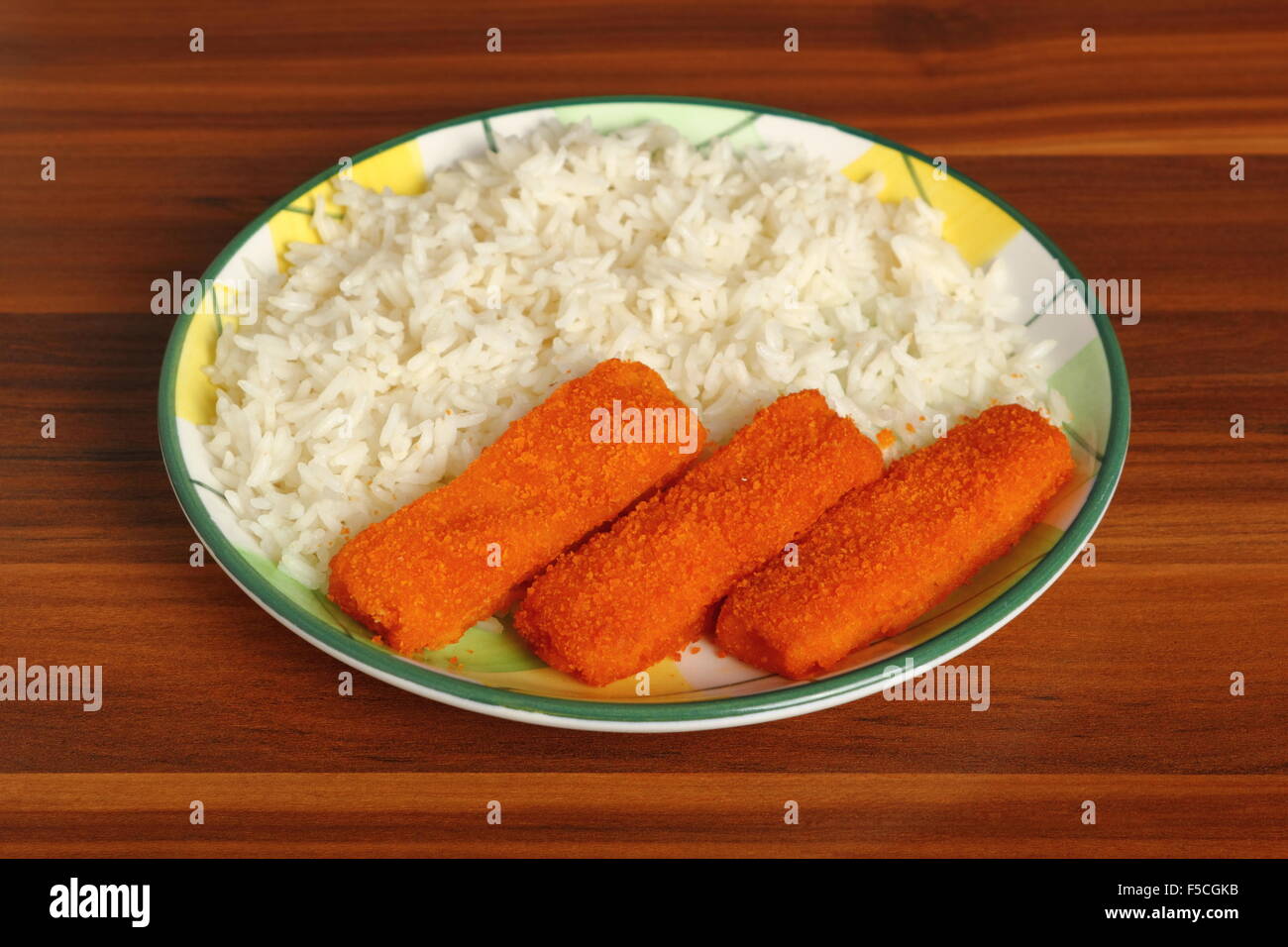 Rice and Fish Fingers Stock Photo - Alamy