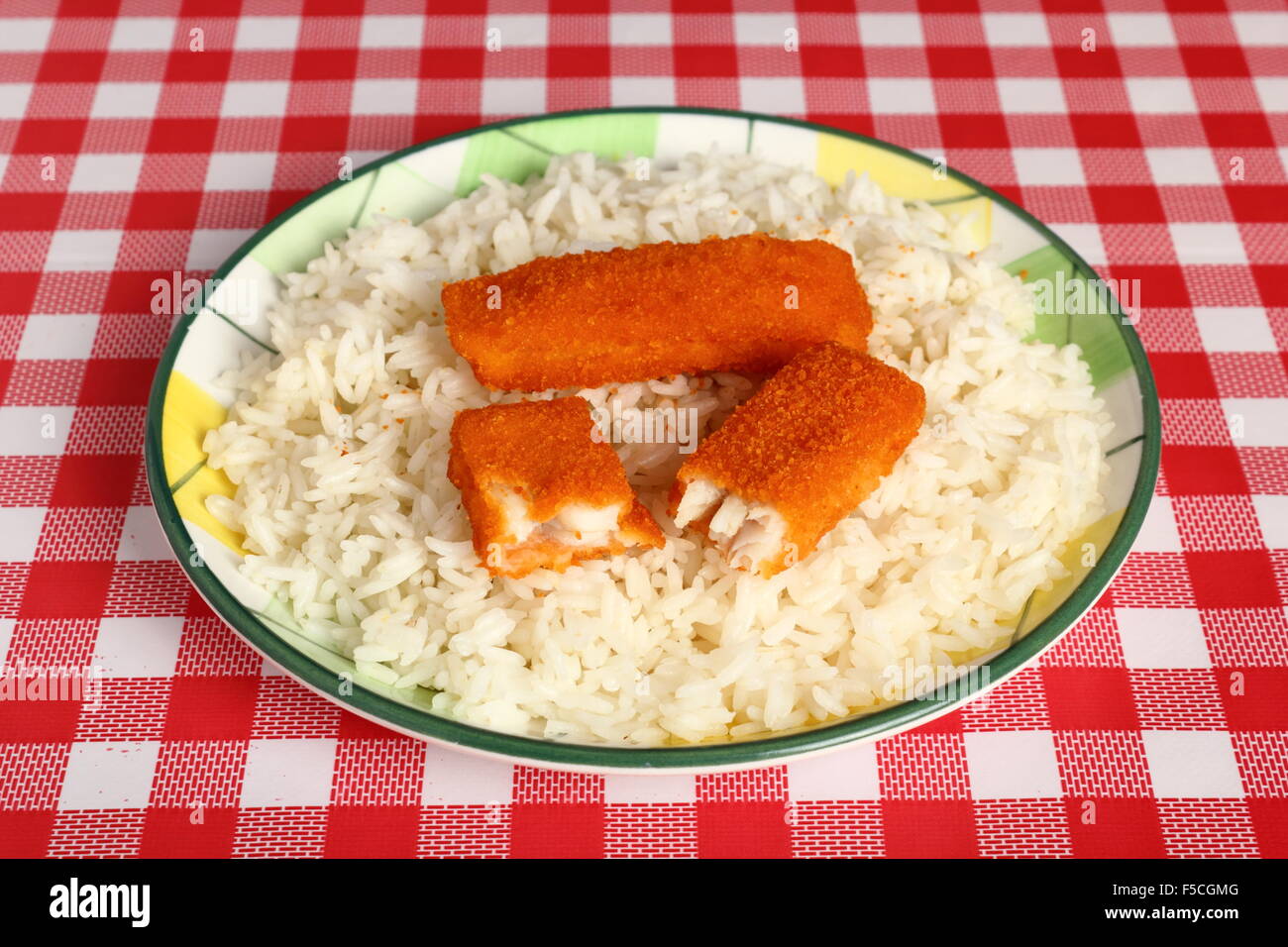 Rice and Fish Fingers Stock Photo - Alamy