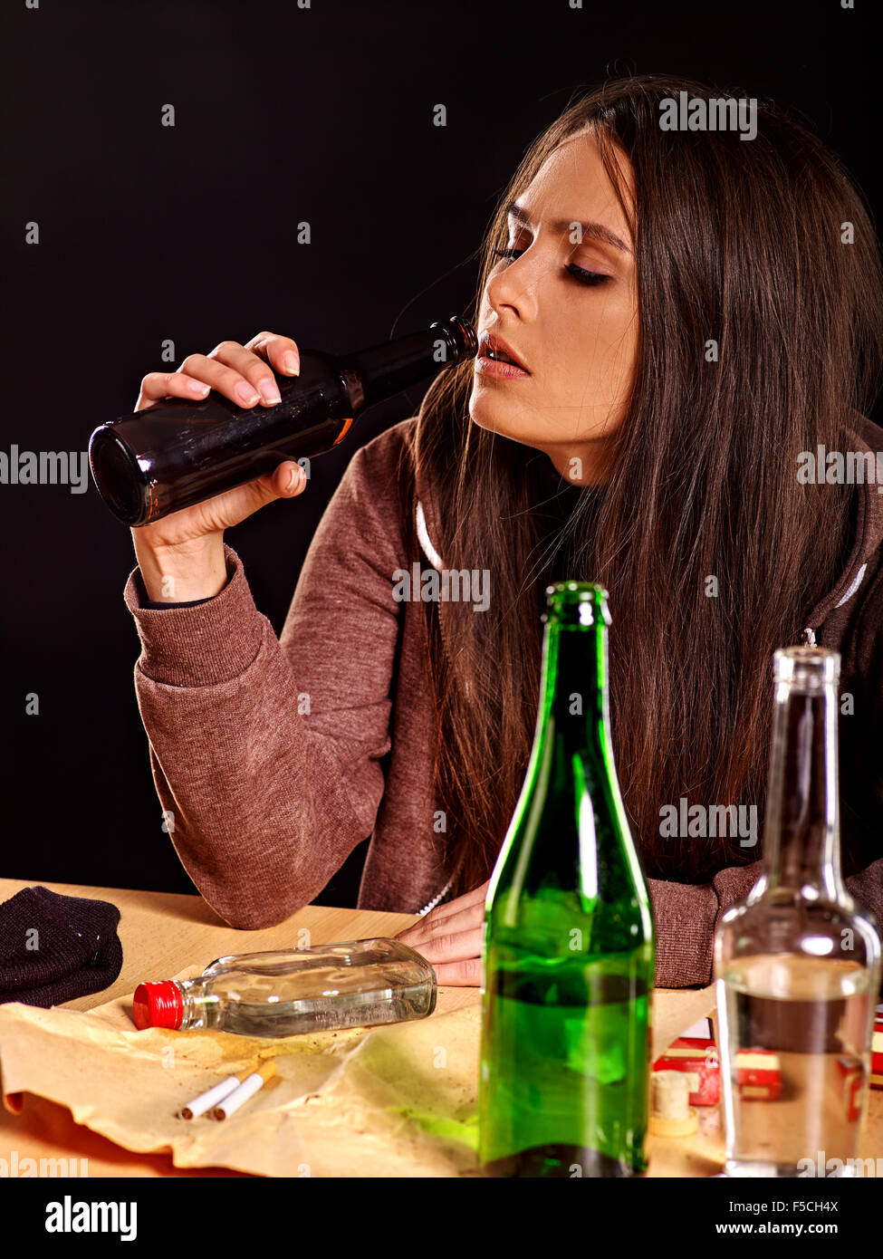 Drunk girl holding bottle vodka hi-res stock photography and images - Alamy