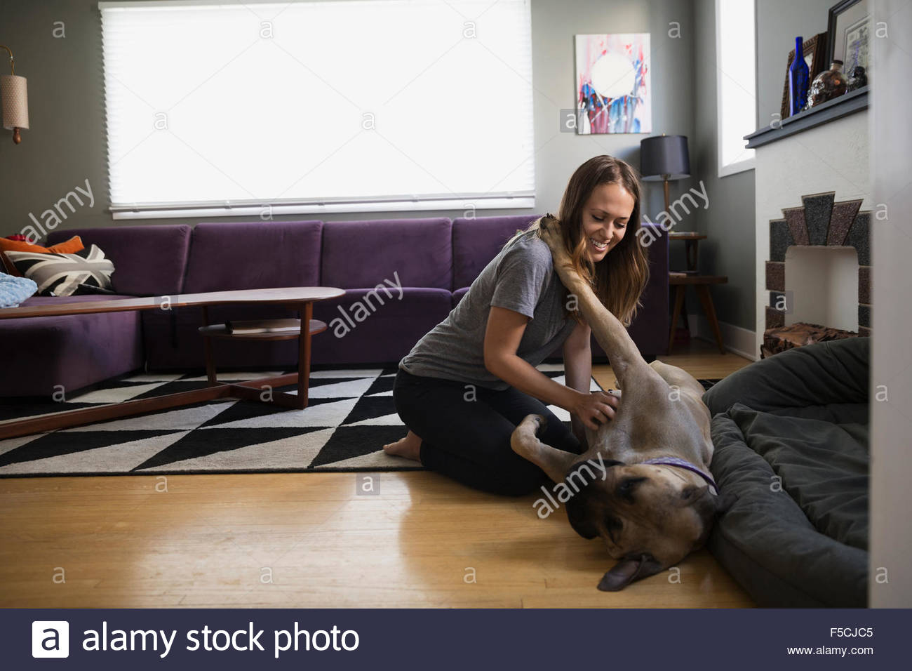 Belly scratching hi-res stock photography and images - Alamy