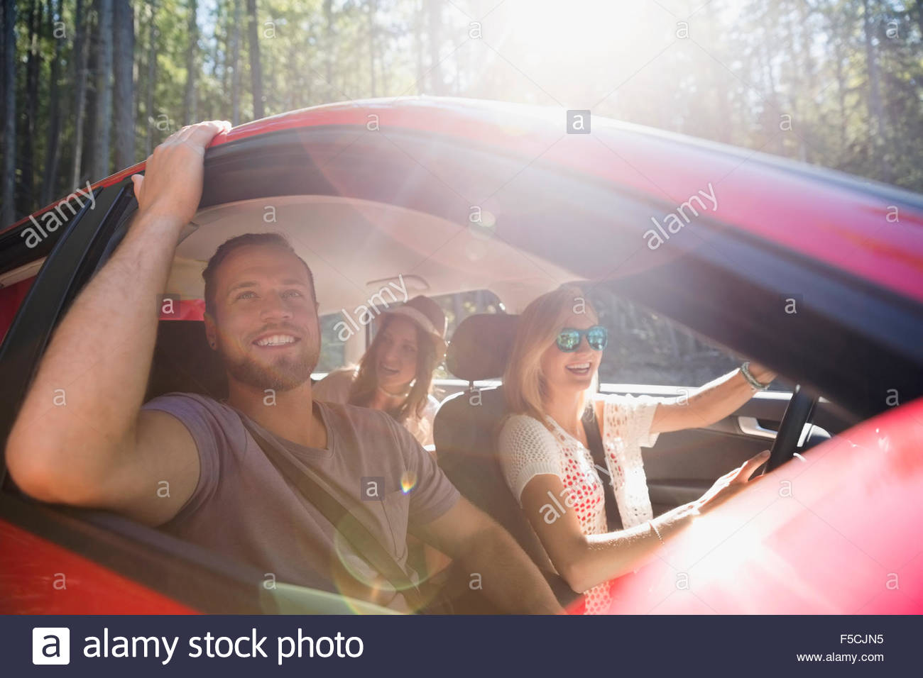 Smile sitting together riding hi-res stock photography and images - Alamy