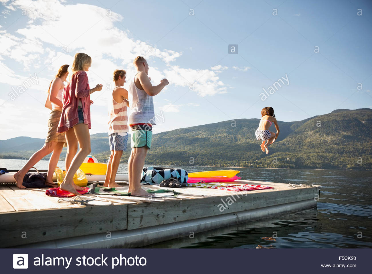 Jumping off dock hi-res stock photography and images - Alamy