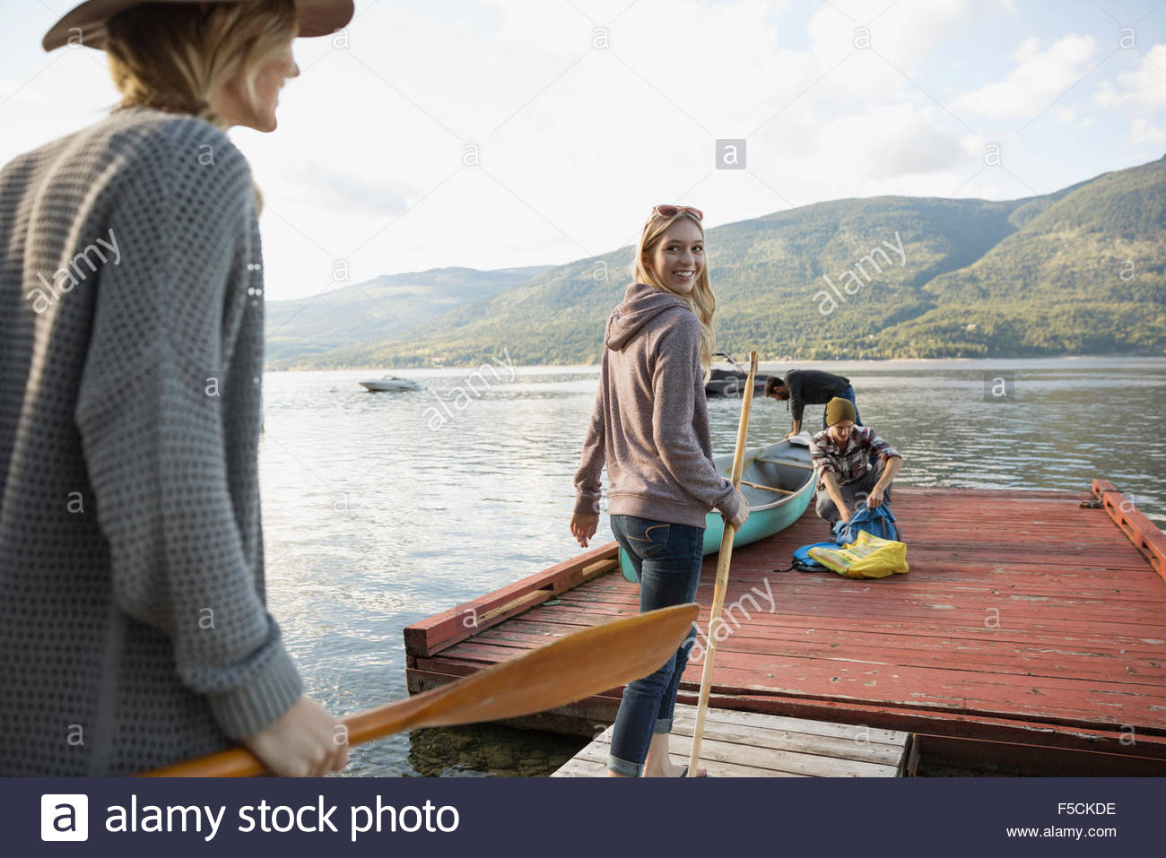 Carrying canoe together hi-res stock photography and images - Alamy