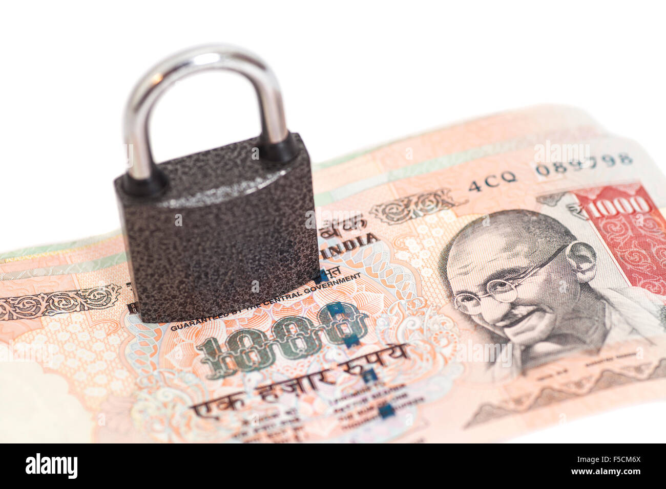 Indian banknote padlock hi-res stock photography and images - Alamy