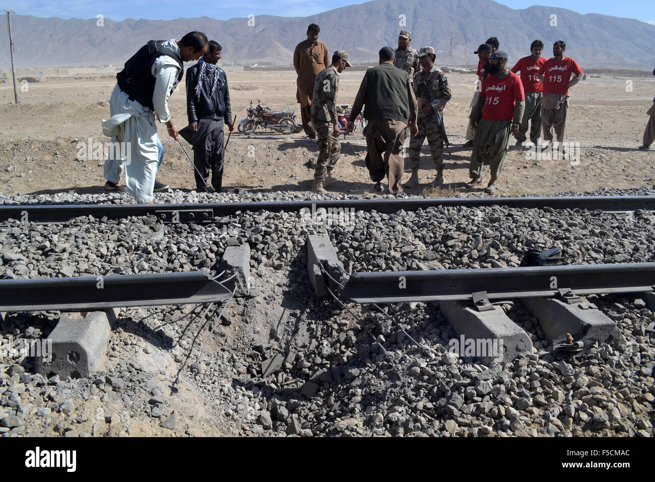 Mastung, Pakistan. 1st Nov, 2015. Security officials examine damaged ...