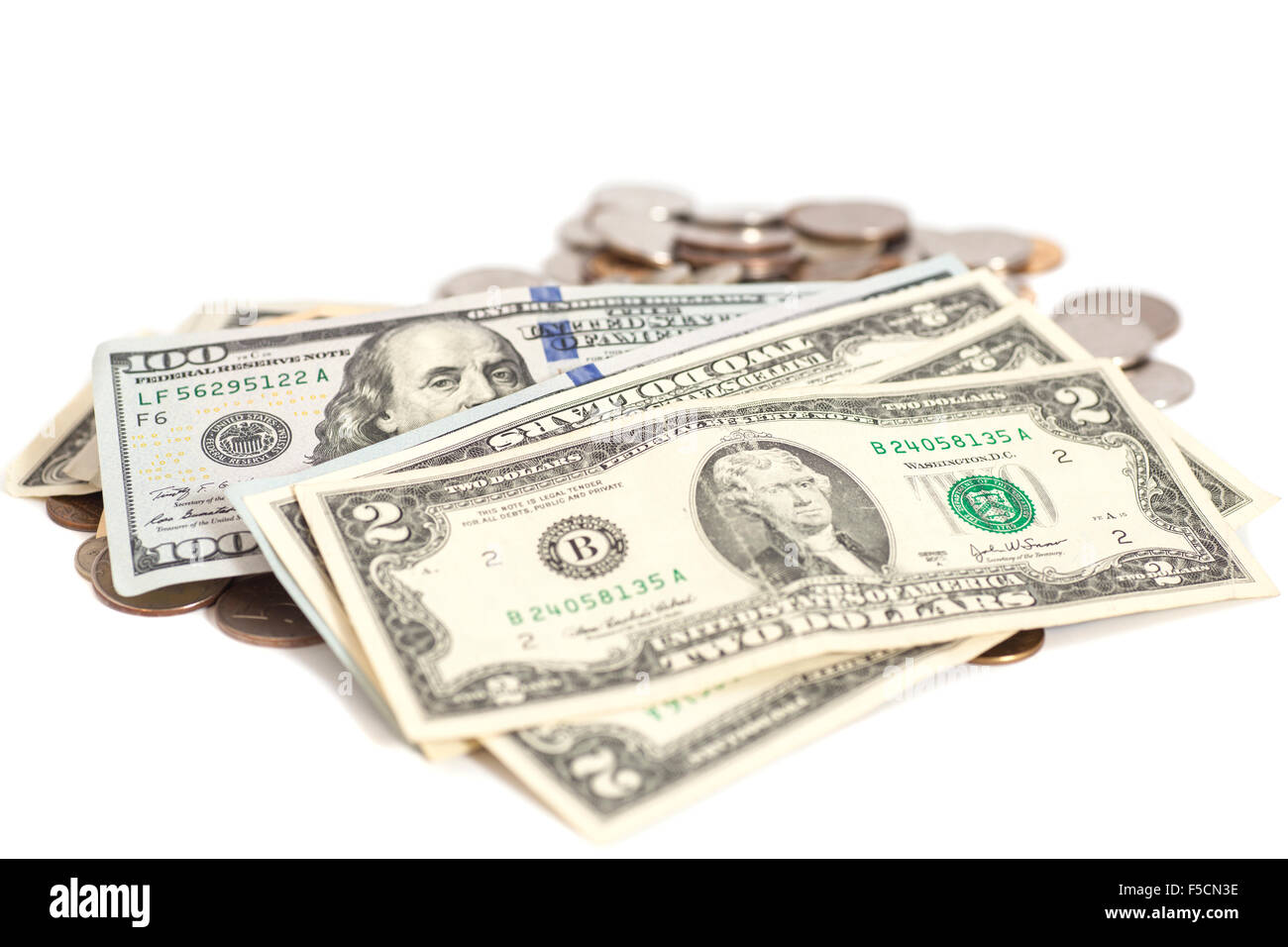 US dollars banknote and coins on white background Stock Photo - Alamy