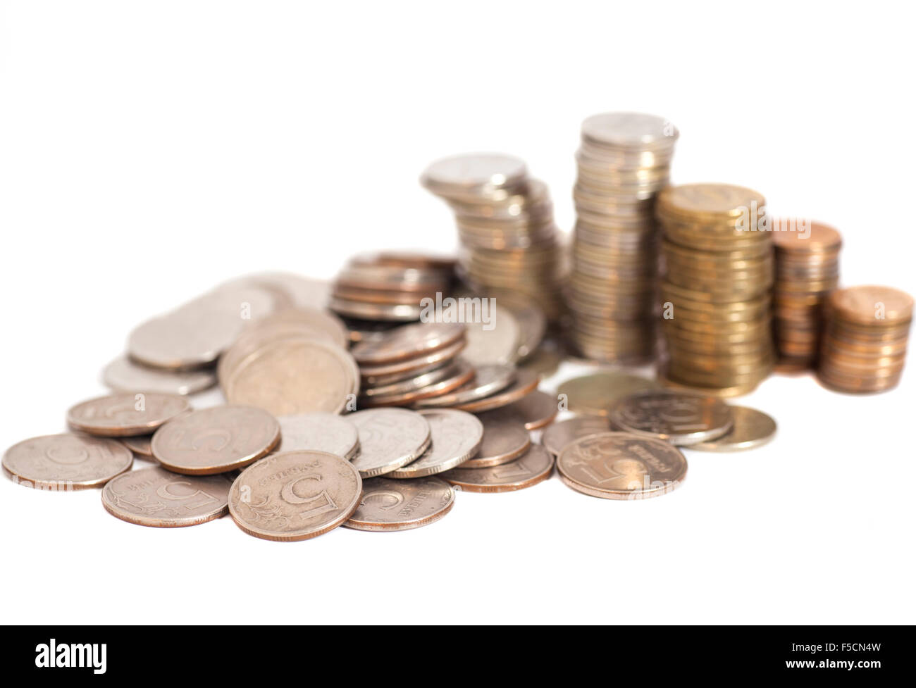 Stack of coins isolated on white Stock Photo - Alamy
