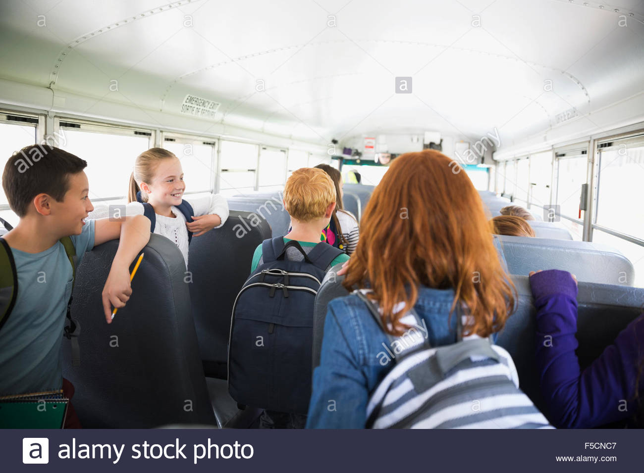 Children getting off school bus hi-res stock photography and images - Alamy