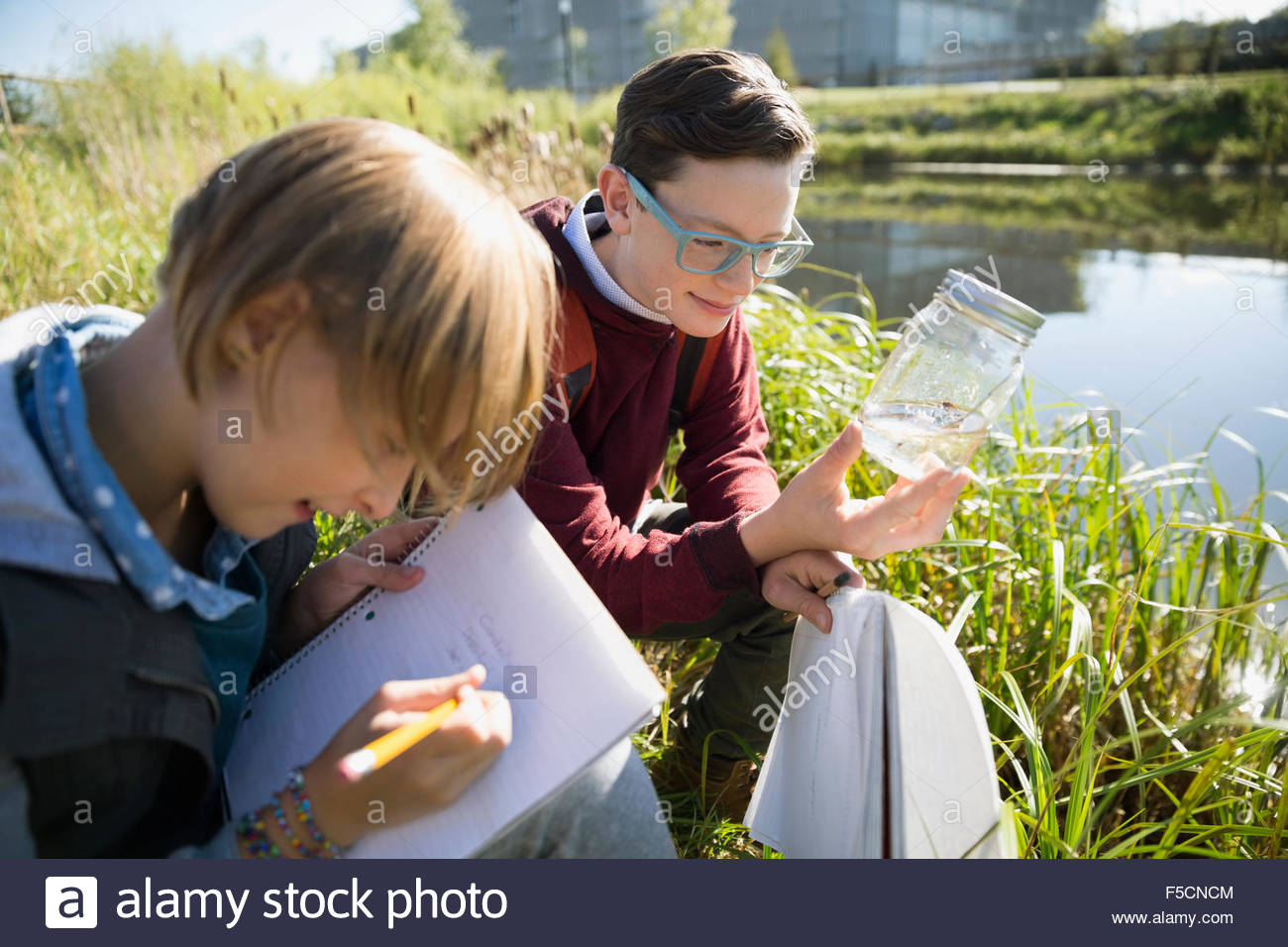 Boy taking notes hi-res stock photography and images - Alamy