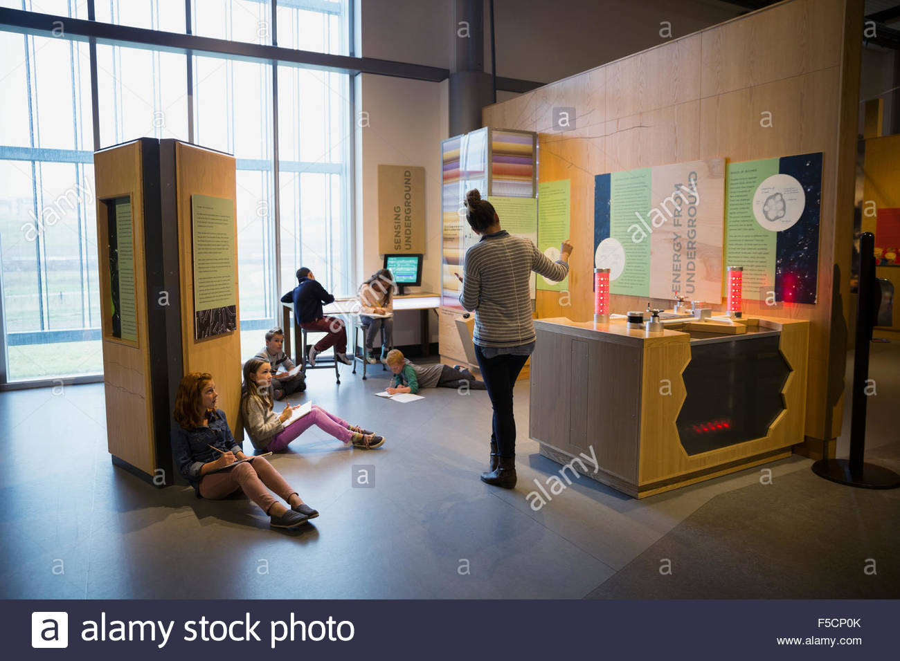 Students writing in notebooks hi-res stock photography and images - Alamy
