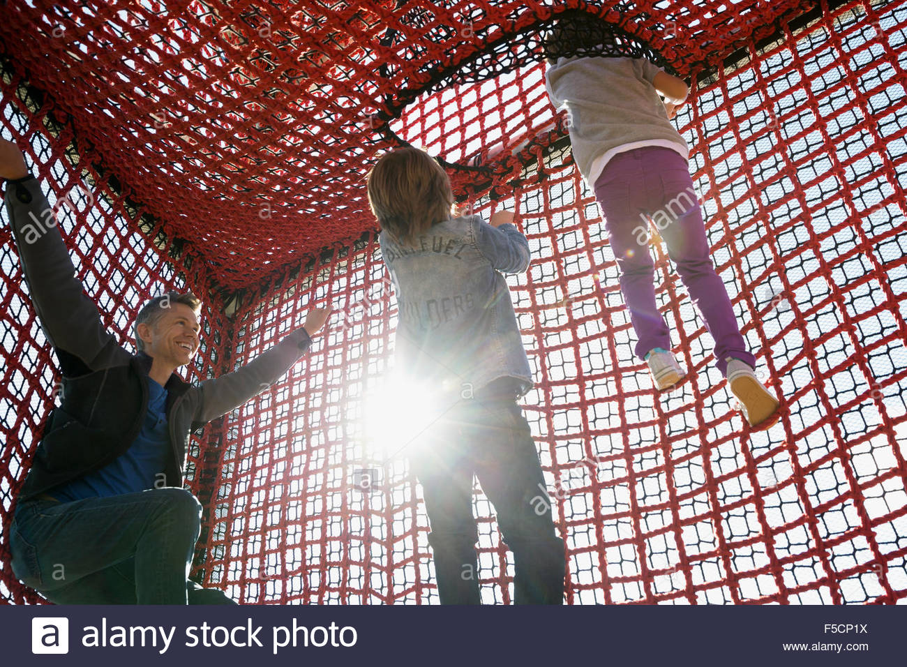 Child climbing rope hi-res stock photography and images - Alamy