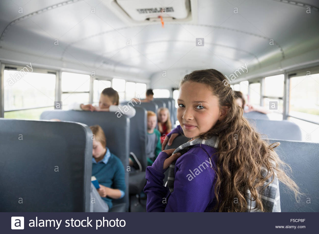 Side view smiling middle school girl hi-res stock photography and ...