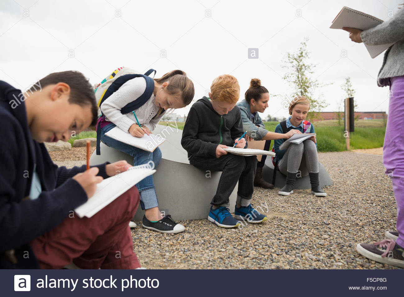 Student students writing hi-res stock photography and images - Alamy