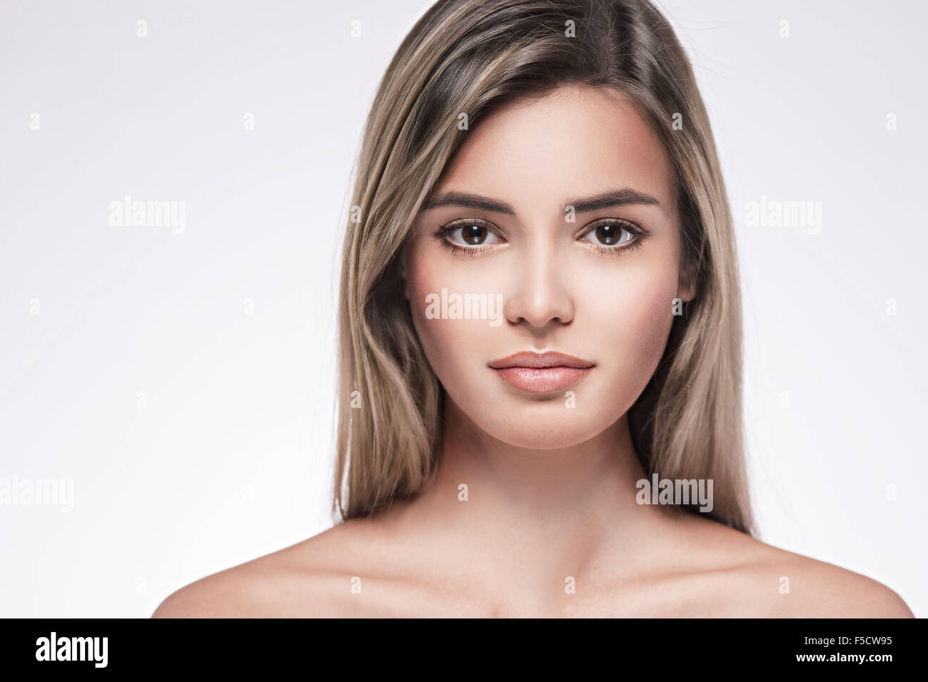 Young beautiful woman face portrait with healthy skin Stock Photo - Alamy