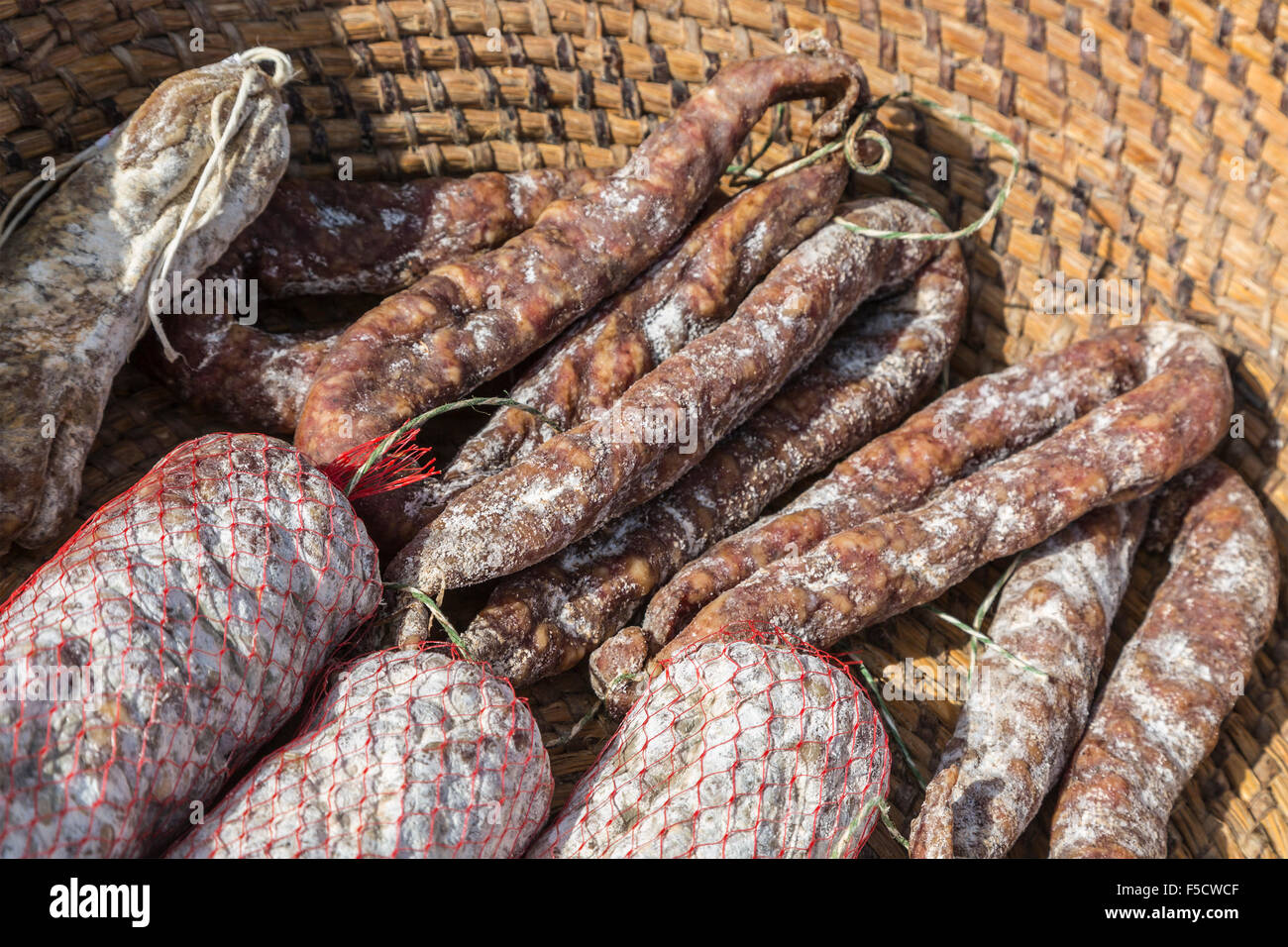 Various types of traditional French dry sausages - street market detail ...