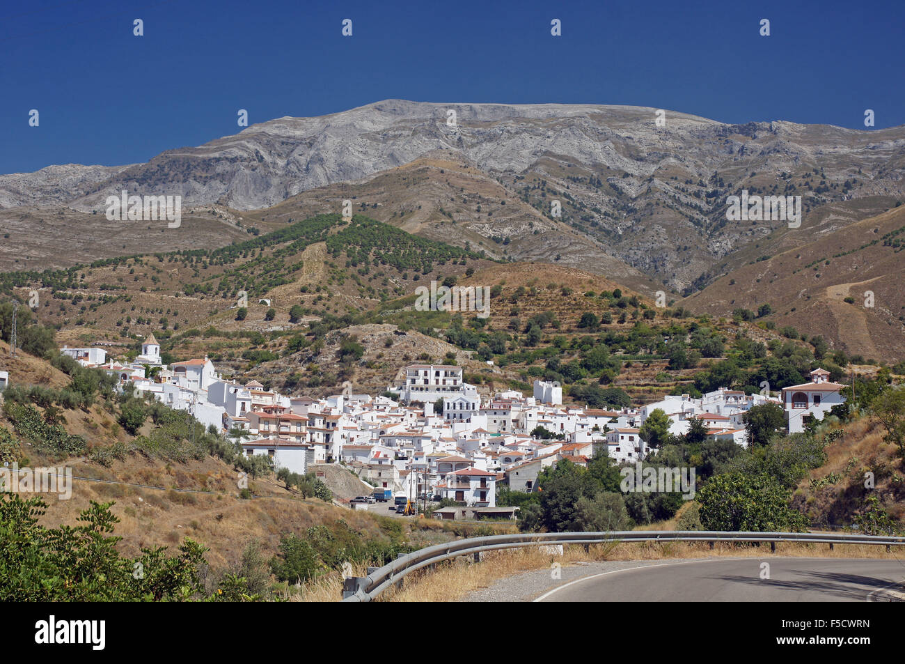 Andalucia in Spain: the village of Sedella with the peak of La Maroma ...
