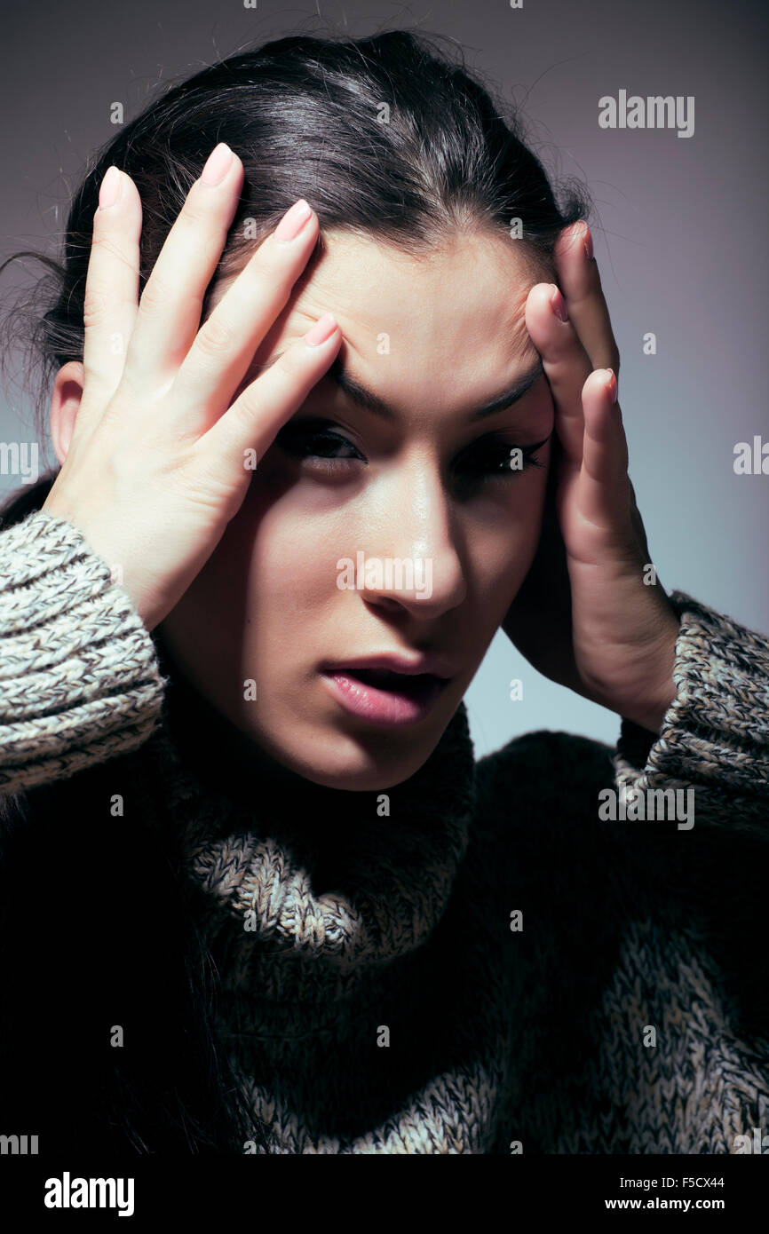 young pretty woman in trouble, screaming in grief close up Stock Photo ...