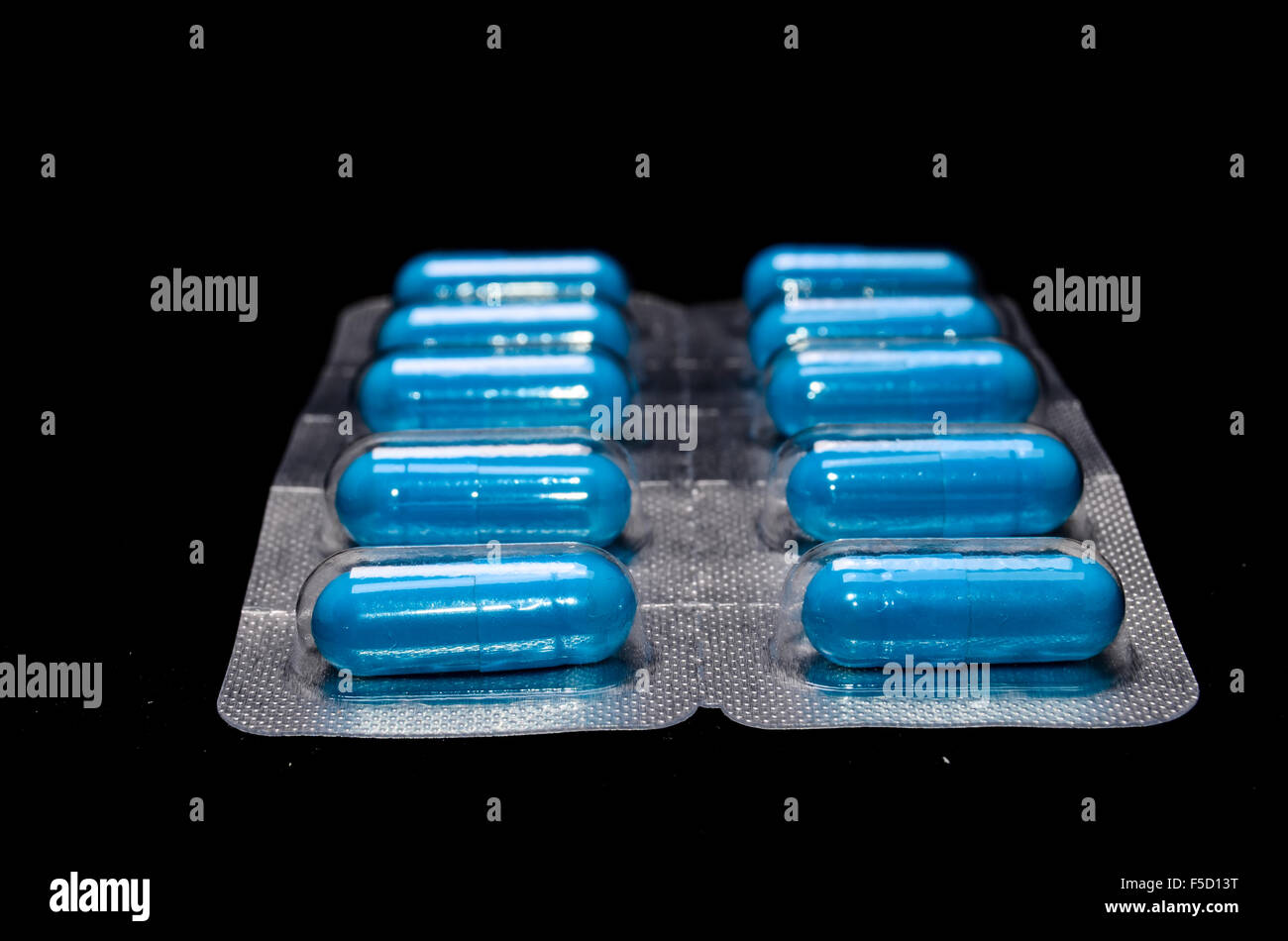 Blue Medication Capsules In Blister Pack Stock Photo - Alamy