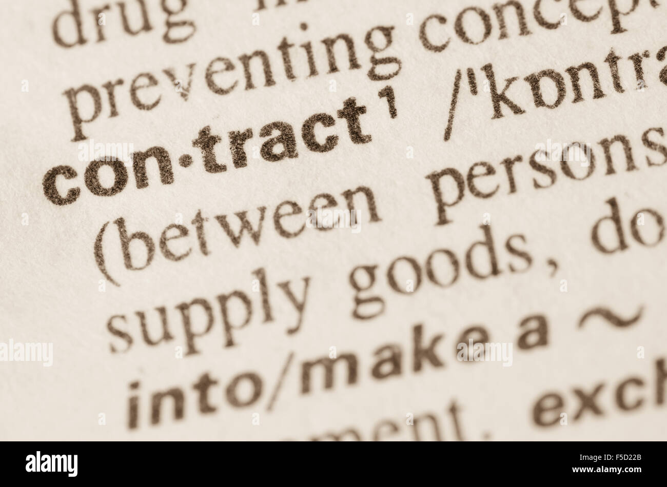 Definition of word contract in dictionary Stock Photo - Alamy