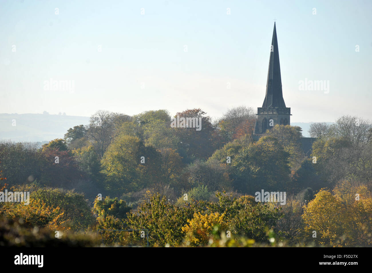 Autumn scene in South Yorkshire village during unseasonal warm weather ...