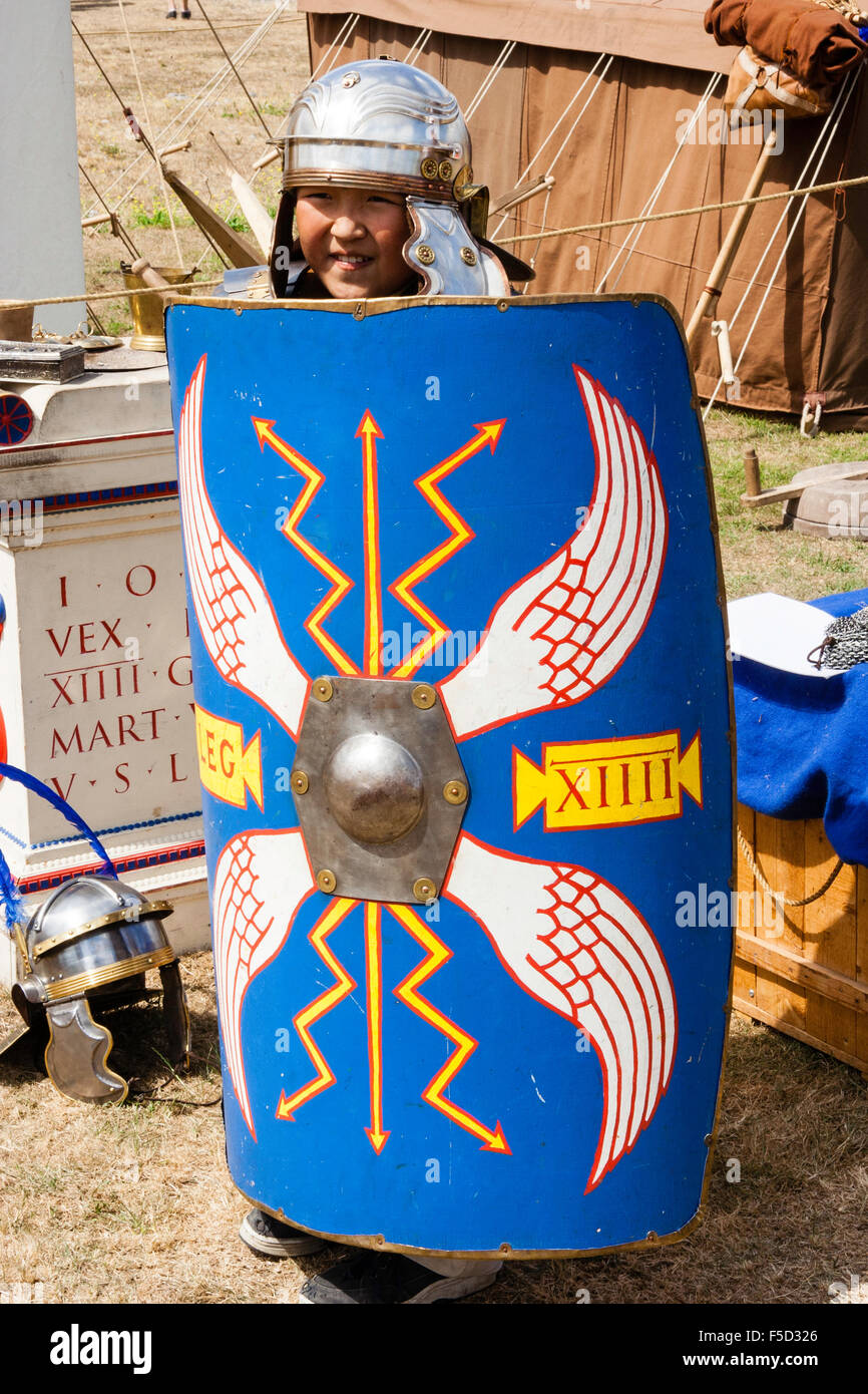 England, Richborough Roman castle. Young smiling Asian, child, boy ...