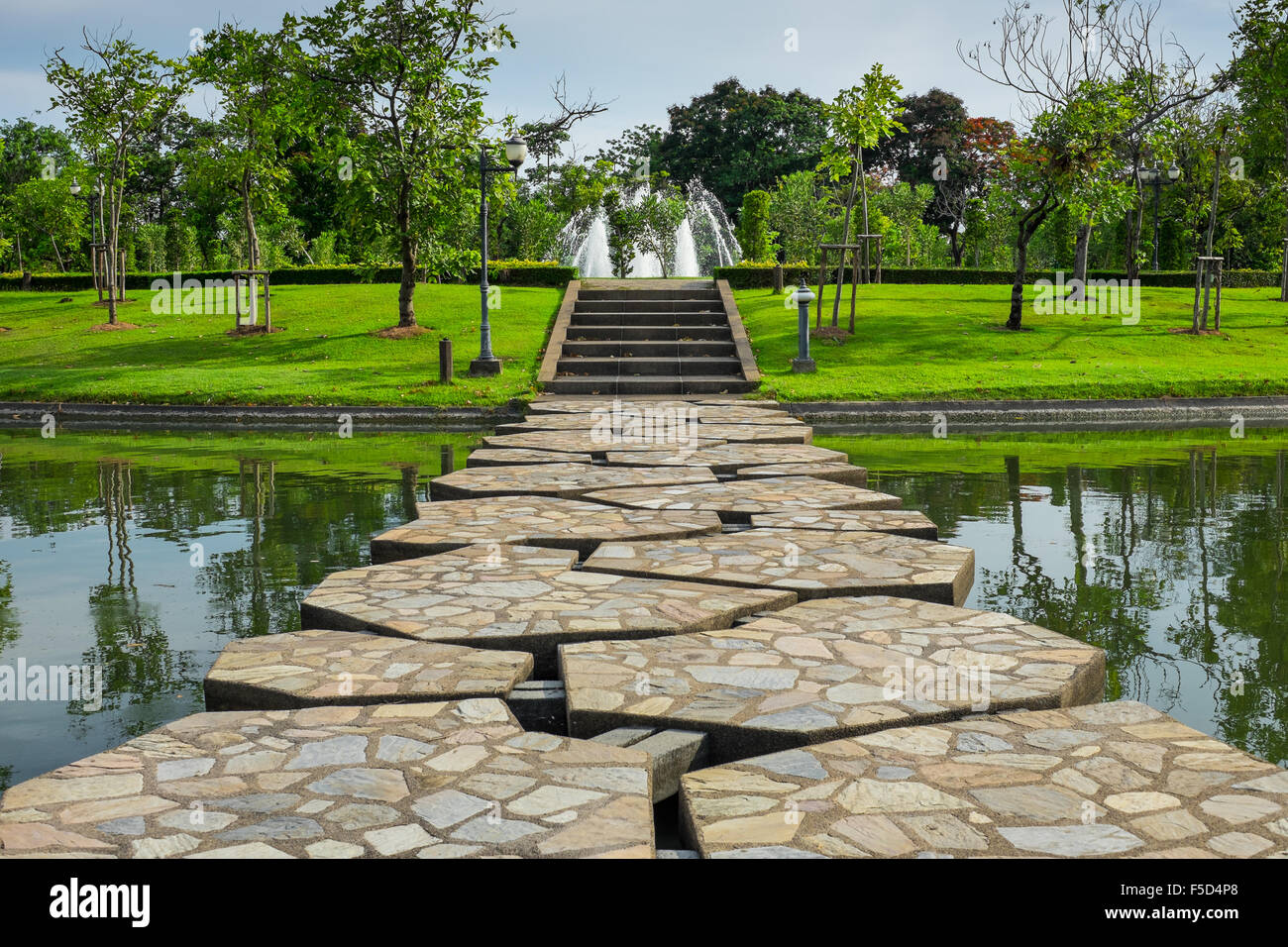 Beautiful stone bridge across the lake in Sirikit park, Bangkok ...