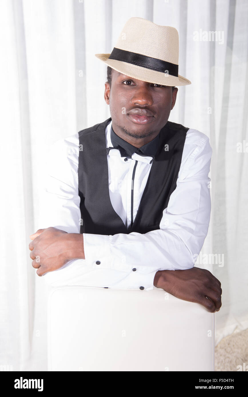 attractive african man is posing Stock Photo - Alamy