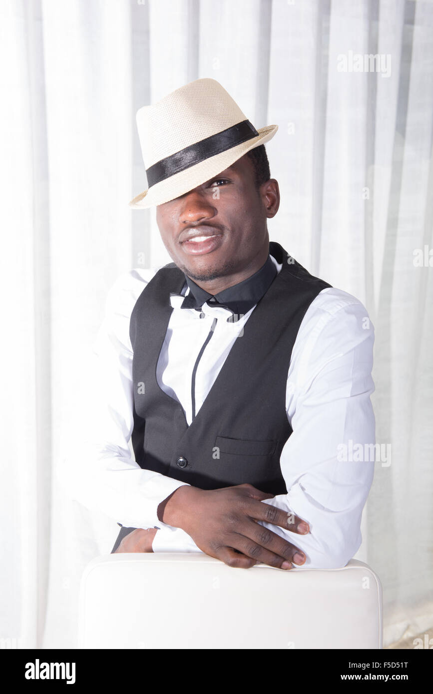 attractive african man is posing Stock Photo - Alamy