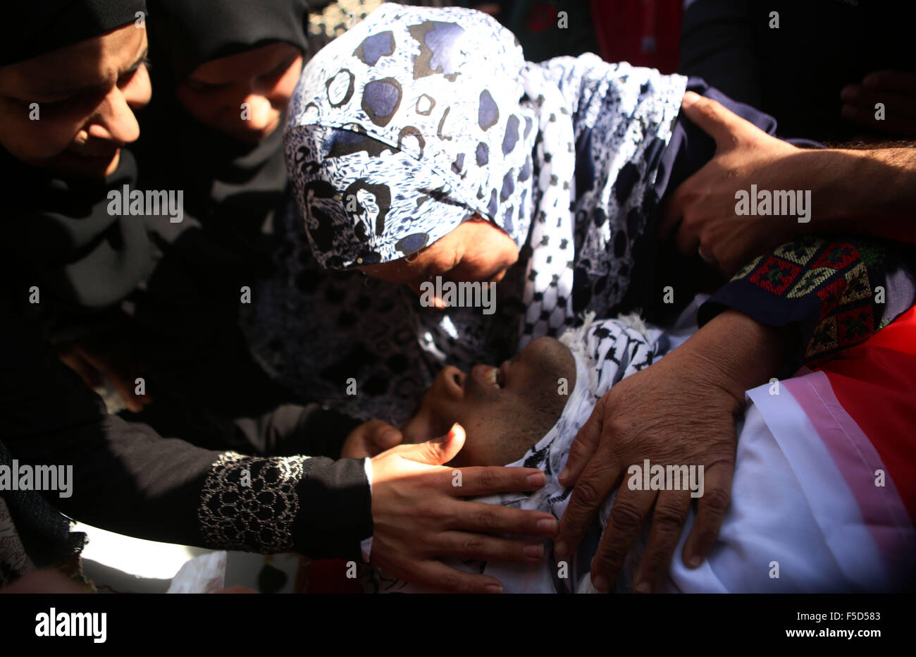 Qatana, West Bank, Palestinian Territory. 2nd Nov, 2015. Relatives ...