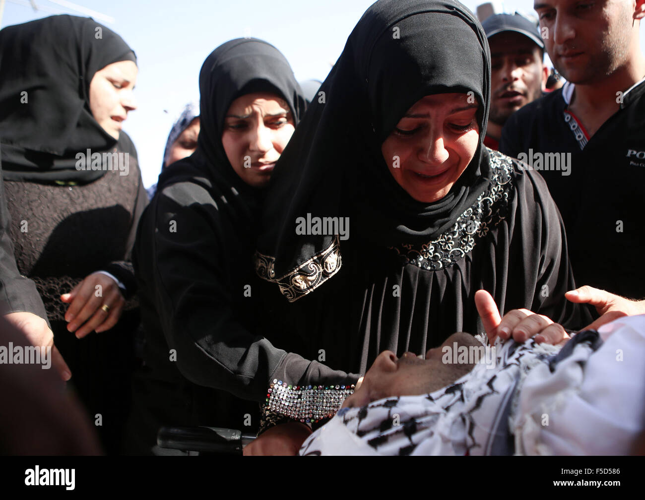 Qatana, West Bank, Palestinian Territory. 2nd Nov, 2015. Relatives ...