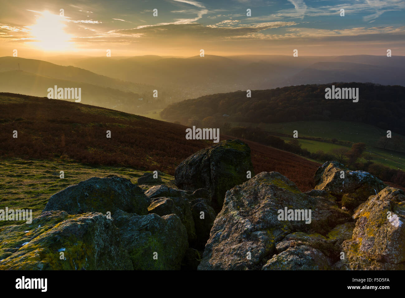 Helmeth Wood and the Long Mynd seen from a rocky outcrop on the summit ...