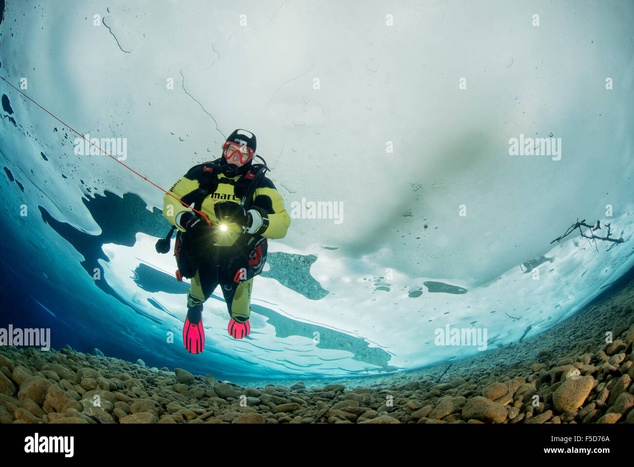 scuba diver under ice with safety robe, scuba icediving, Lechausee ...