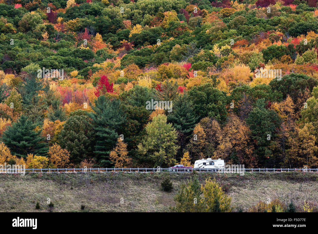 RV camper on an autumn road trip, Castleton, New York, USA Stock Photo ...