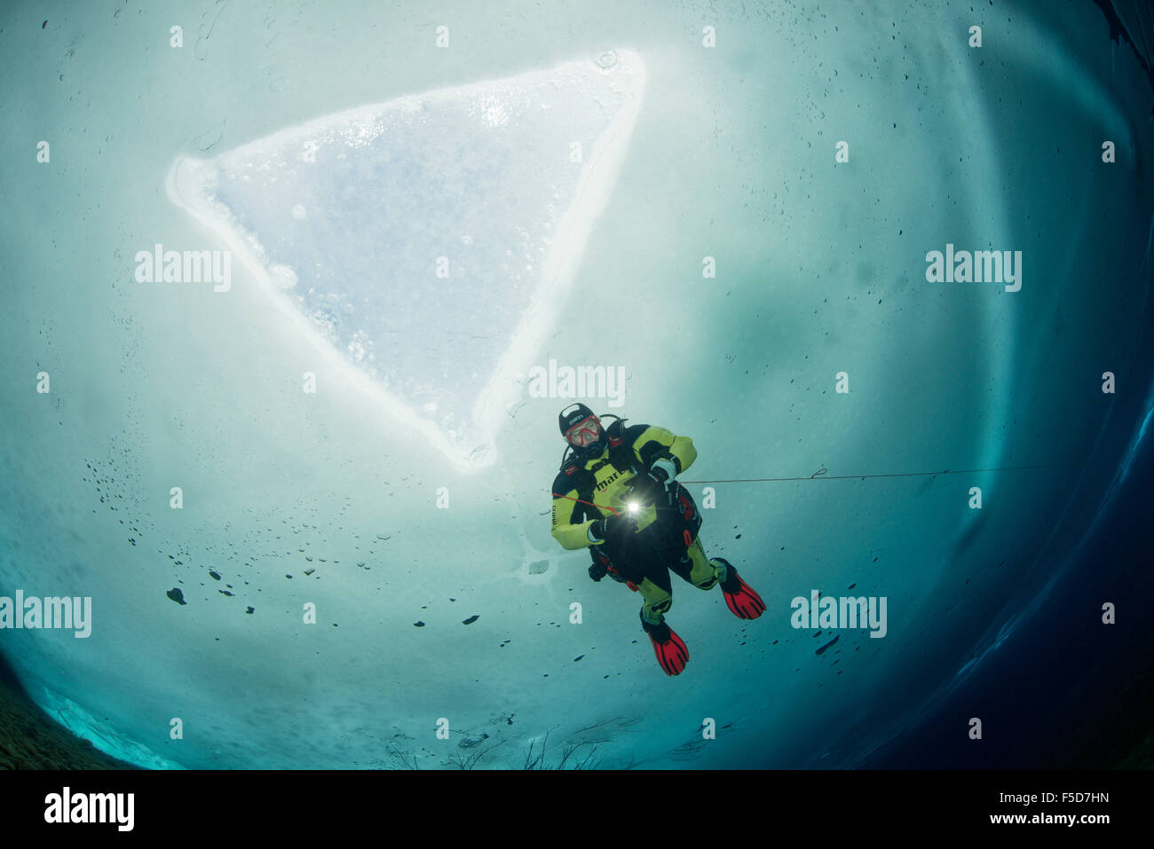 scuba diver under ice or icehole, scuba icediving, Lechausee, Reutte ...