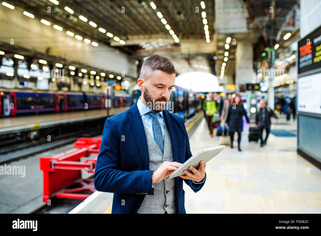 Train reading tablet hi-res stock photography and images - Alamy