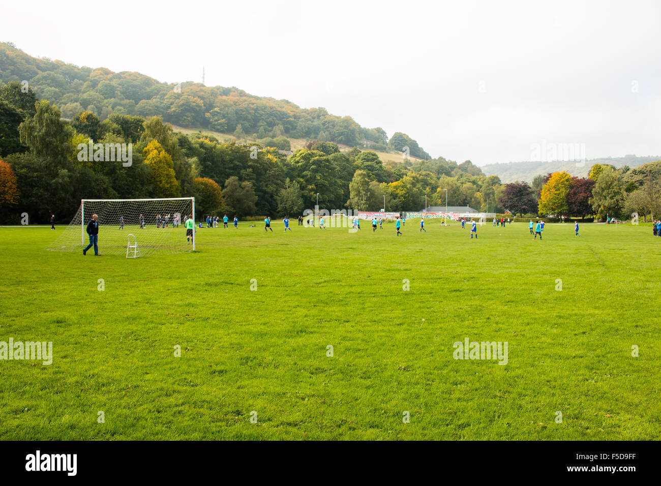 Football match at green Hebden Bridge field. Overcast weather Stock ...
