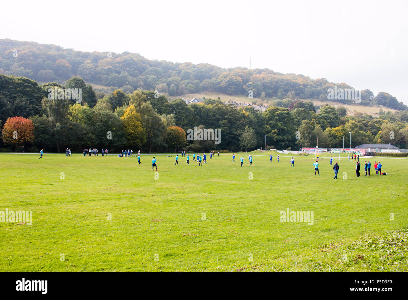 Football match at green Hebden Bridge field. Overcast weather Stock ...