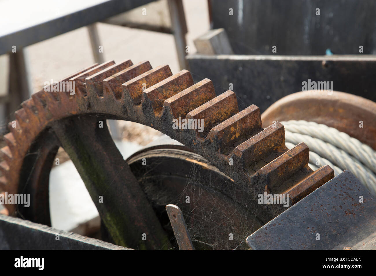 Large rusting metal cog wheel with large teeth Stock Photo - Alamy