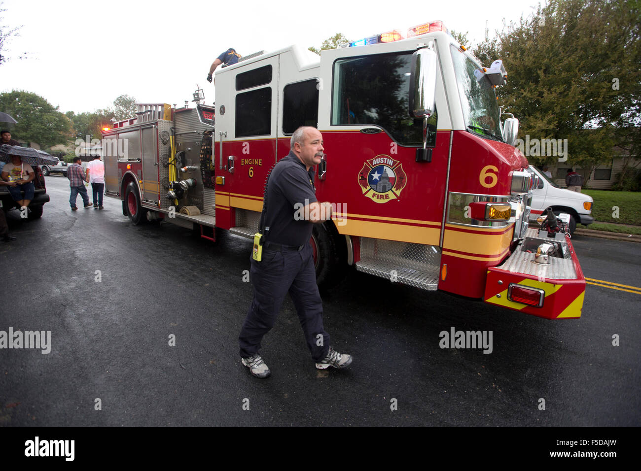 Austin police, firefighters and other city emergency workers monitor ...