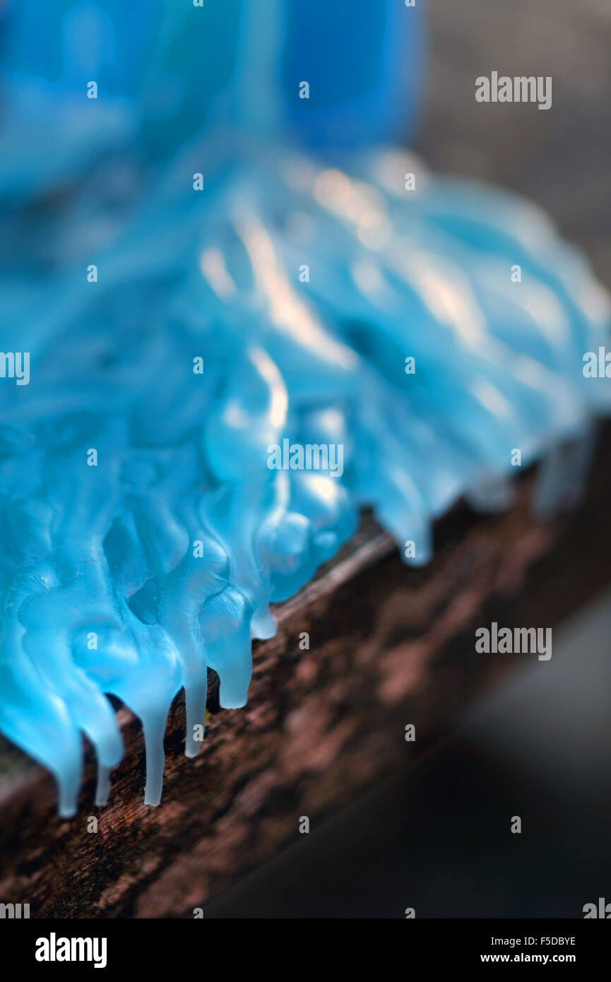 Melted blue candle Stock Photo - Alamy